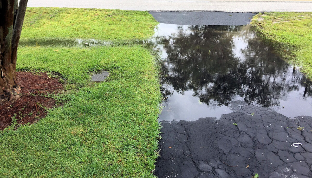 Building Gravel Roads: Cutting Water Bars Before Gravel